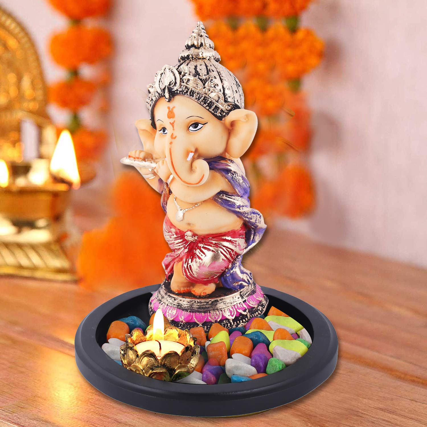 Beige and Silver Ganesh Idol in Krishna Pose for Ganesha Sankashti Pooja