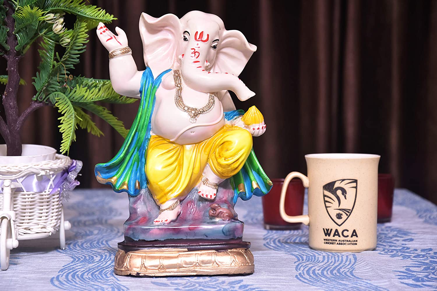 Eleven Inch Beige Ganesh Idol in dancing pose for Ganesha Sankashti Pooja