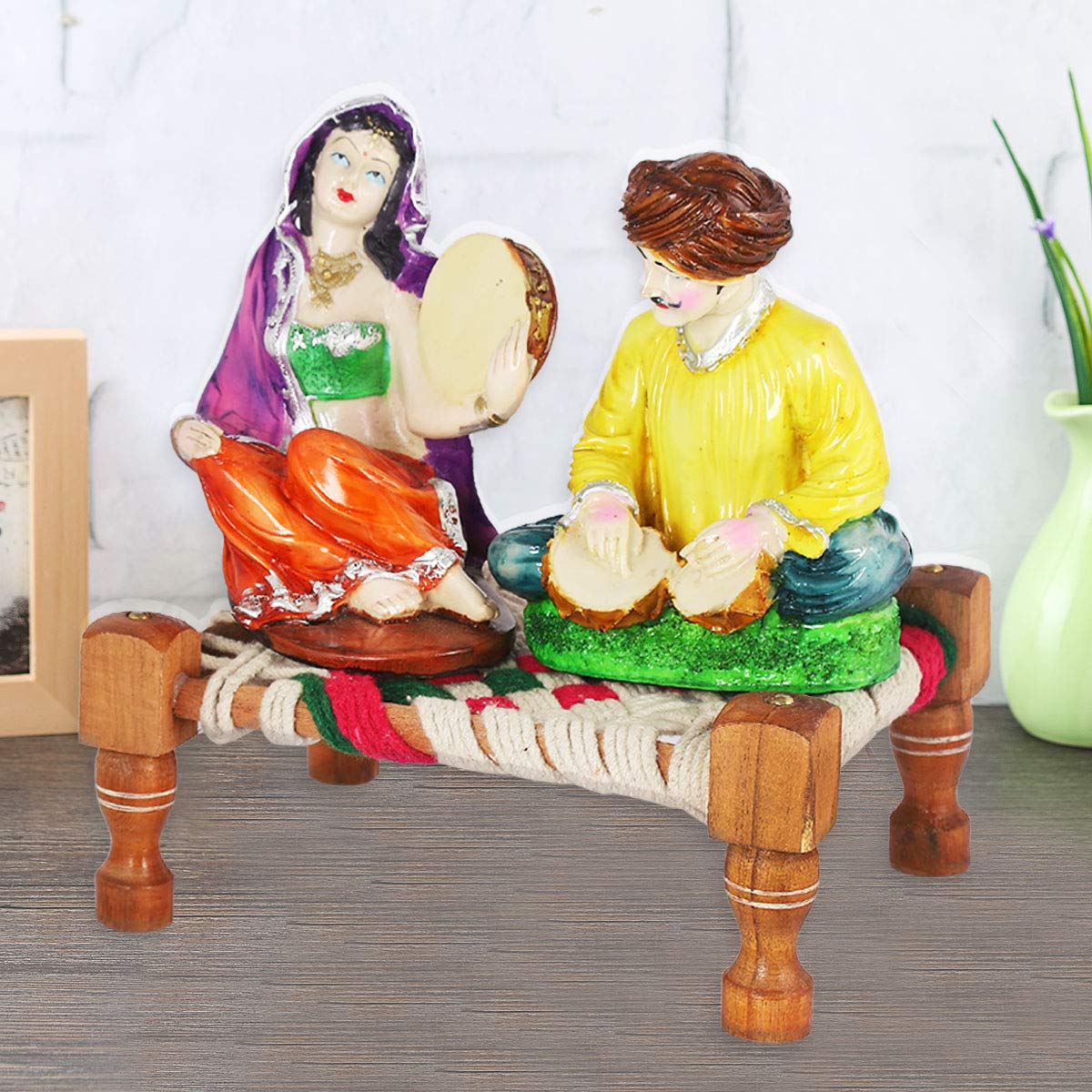 Rajasthani Couple Statue playing musical instruments sitting on Khat ...
