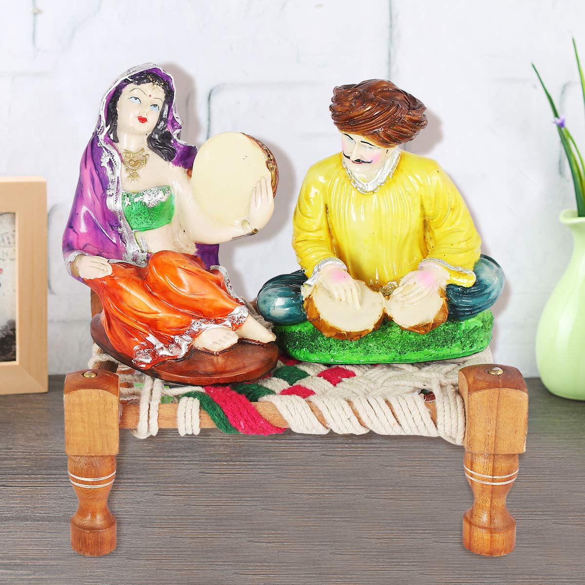 Rajasthani Couple Statue playing musical instruments sitting on Khat ...