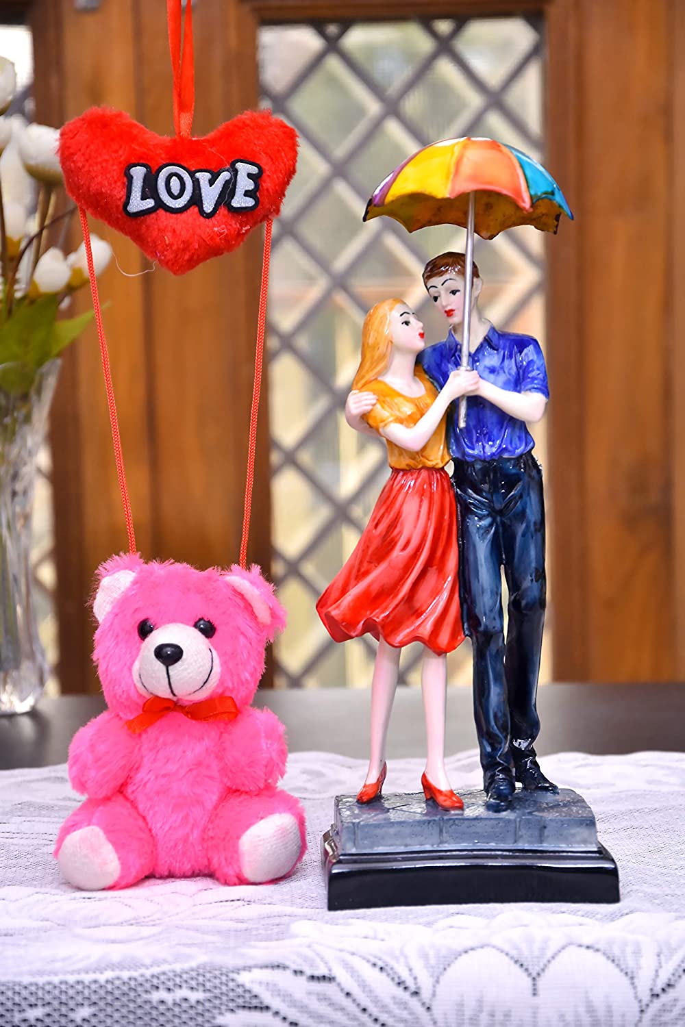 Buy Orange & Blue Couple Statue with Teddy Online – The Perfect ...